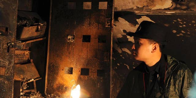 Apartment fire kills 13, many hospitalized in central Chinese city of ...