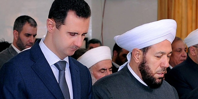 Syria's Assad makes plea to African summit for help in ending crisis ...