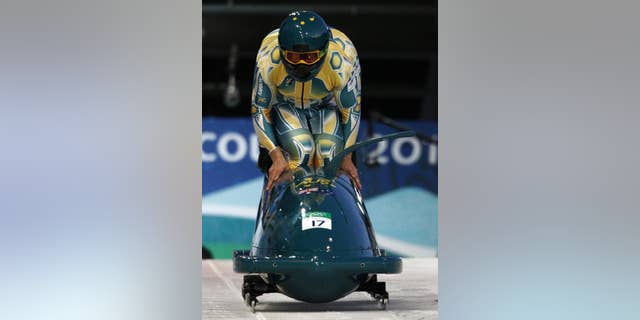 Olympic Bobsledder Has Wardrobe Malfunction, Busts Out of Suit | Fox News