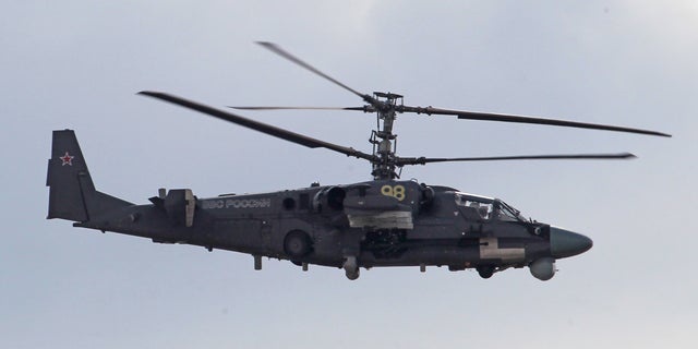 Russian army helicopter rocket accidentally hits bystanders | Fox News