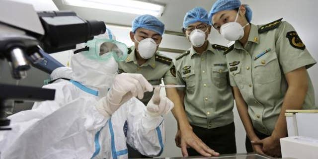 WHO says drawing up six-nine month strategy to combat Ebola | Fox News