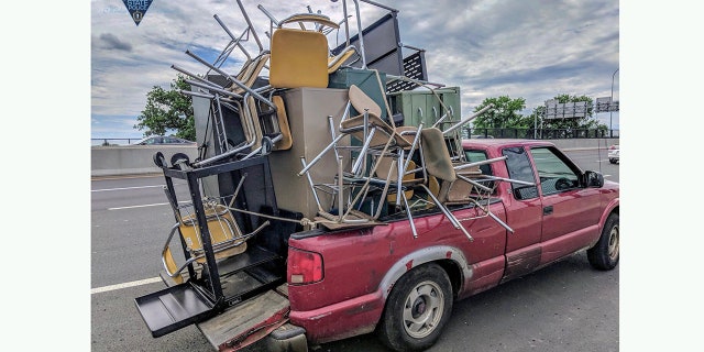 Overloaded pickup full of furniture has police asking 'What Could Go ...