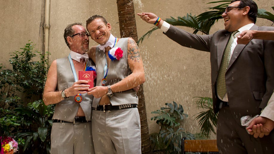 Russian Gay Couple Marries In Argentina Will Seek Asylum Fearing
