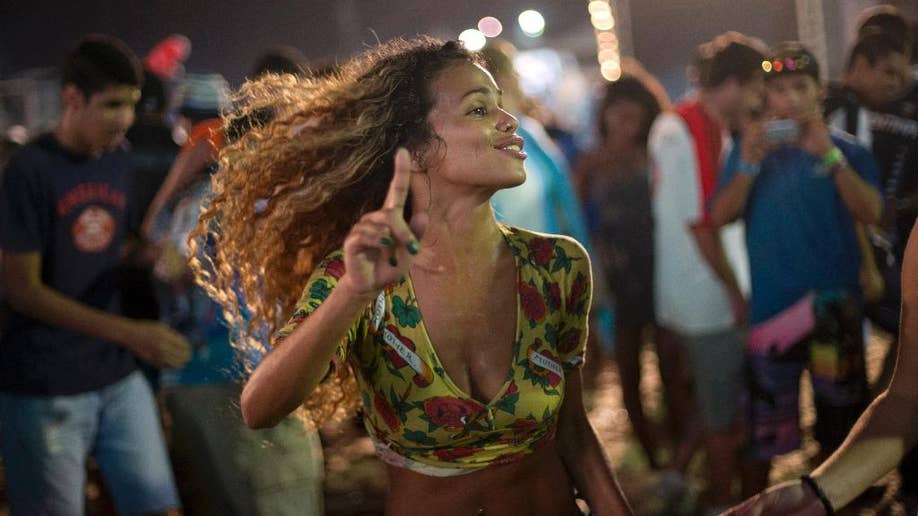 Brazilian Women Celebrate Wcup For Bringing Bonanza Of Men Helping Fix