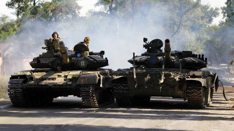 6 Killed As Fighting Heats Up In Eastern Ukraine Despite Cease Fire