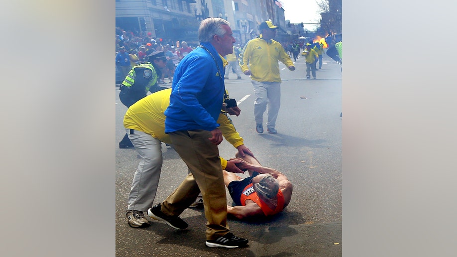 3 dead, more than 130 injured as 2 bombs explode near Boston Marathon ... 3 dead, more than 130 injured as 2 bombs explode near Boston Marathon ...