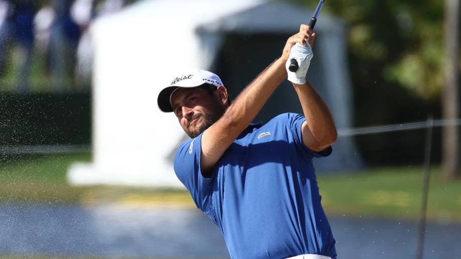 Adam Scott makes solid debut with short putter; Bubba loses track of ...