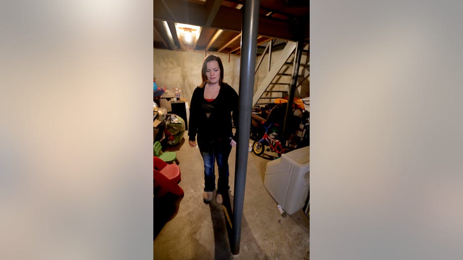 Judge rules Mo. teen found handcuffed to basement pole will stay with ... Judge rules Mo. teen found handcuffed to basement pole will stay with ...
