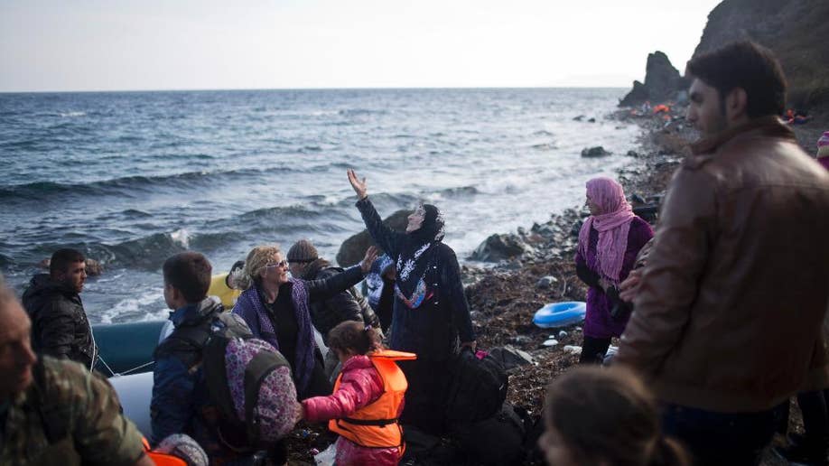 The Latest: Merkel aide downplays flap over Syrian asylum gambit, says ...