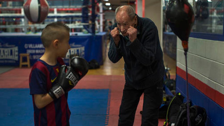 84-year-old boxing coach pledges to keep training Spain's best fighters ...