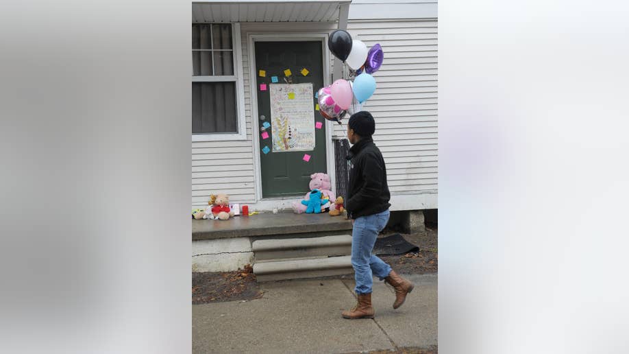 Detroit mother whose 2 kids were found dead in freezer faces ...