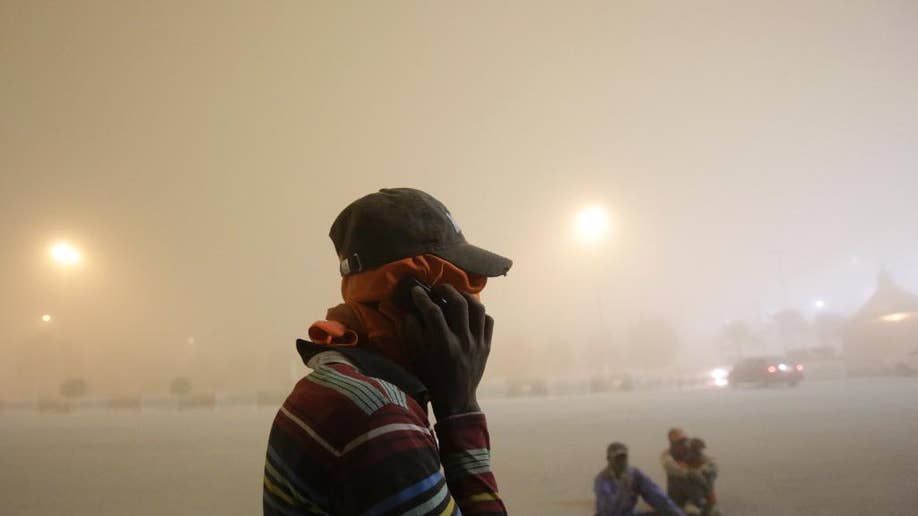 Sandstorm descends on Gulf cities, reducing visibility and diverting ...