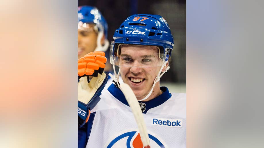 Oilers sign No. 1 pick Connor McDavid to 3-year, entry-level deal worth $11.3M with bonuses ...