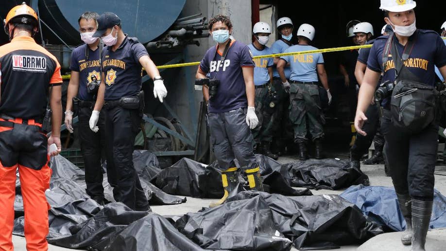 Philippine police launch criminal investigation into factory fire that ... Philippine police launch criminal investigation into factory fire that ...
