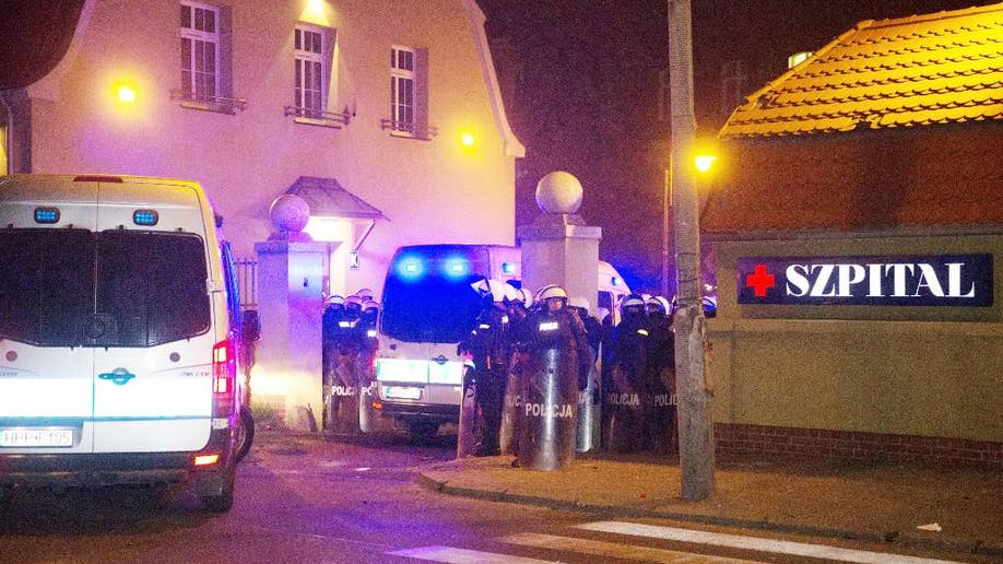 Poland: 1 man dead after getting hit by rubber bullet, 14 officers ...