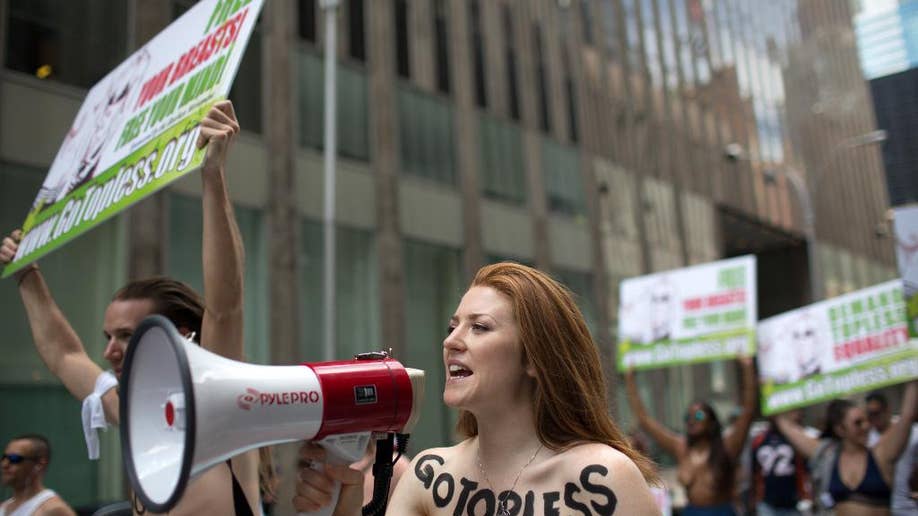 NY stages topless parade with 60 cities worldwide, demanding bare-chest ... NY stages topless parade with 60 cities worldwide, demanding bare-chest ...
