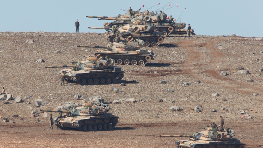 Kurds Defend Syrian Town Near Turkish Border In Deadly Clashes With Isis