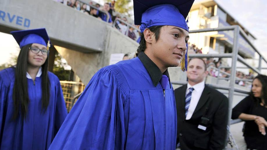 Native American student wears eagle feather at graduation after suing ...