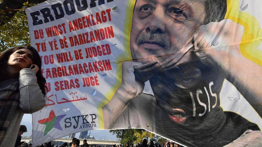 Kurdish demonstrators rally against Erdogan in Cologne | Fox News