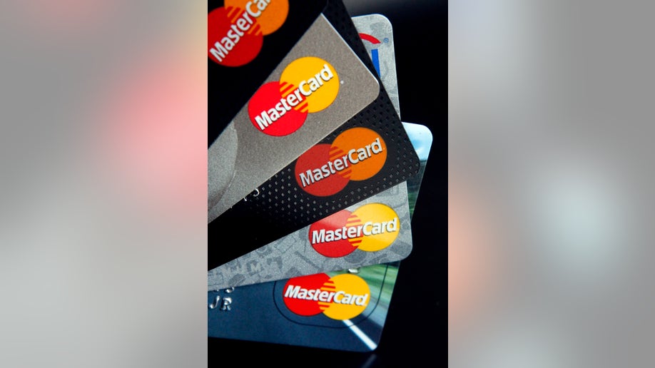 MasterCard posts 1st-qtr profit gain, but says payroll tax hike ...