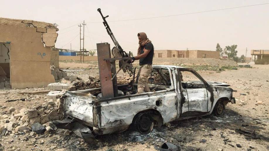 Iraqi officials say Islamic State bomb destroys a sports stadium near ...