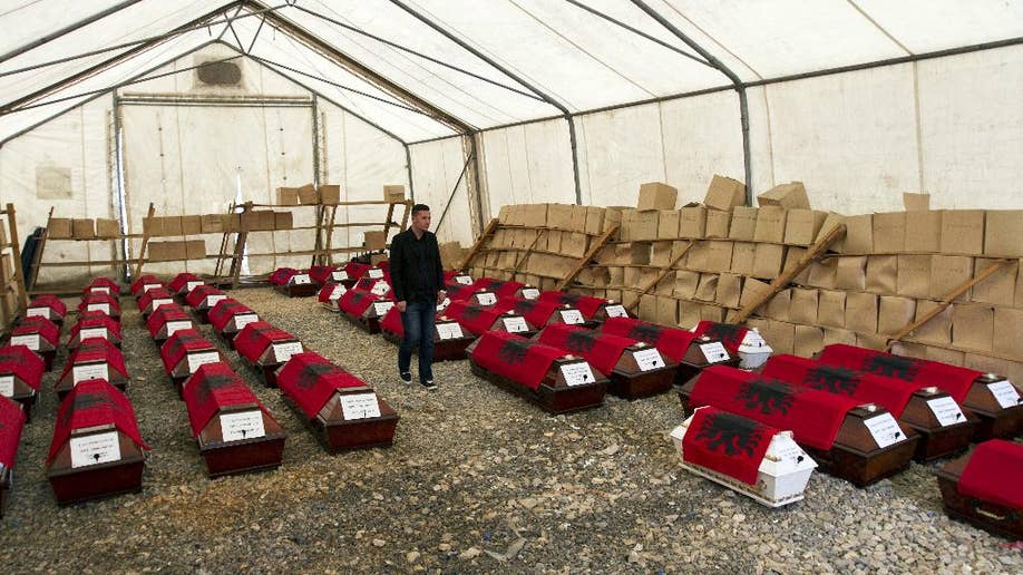 Remains Of 46 Kosovo Albanian Civilians Killed By Serb Forces Handed Over To Their Families
