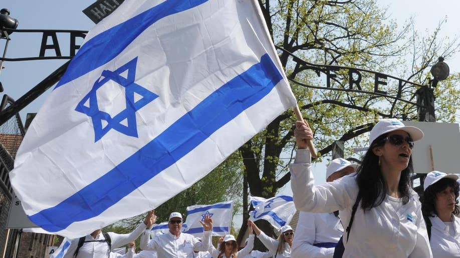 Thousands pay homage to Holocaust victims in Auschwitz march | Fox News