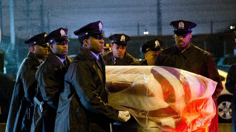 Philadelphia Police Officer Killed While Trying To Stop Robbery Is