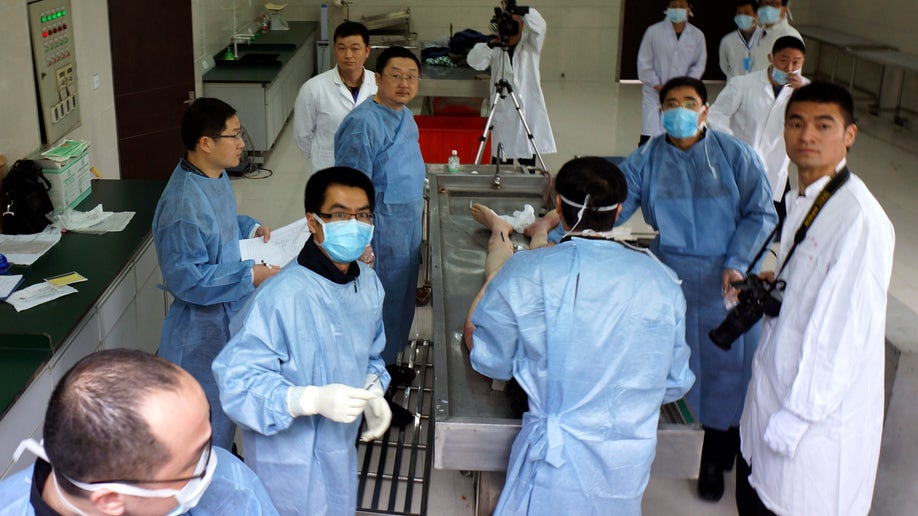 Bruised, battered, Chinese official's death spotlights abuses of Communist Party graft probes ...