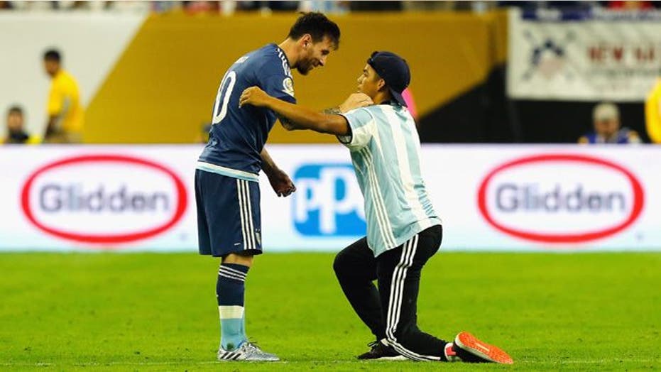 Messi fan runs onto soccer pitch and hugs hero, live tweets it all ...