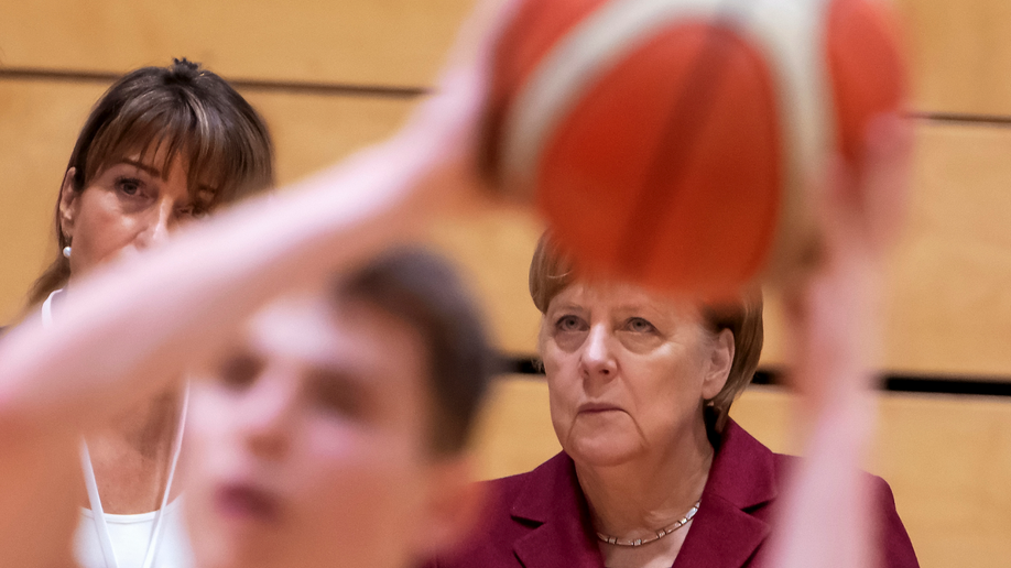 German chancellor visits scene of far-right protest | Fox News