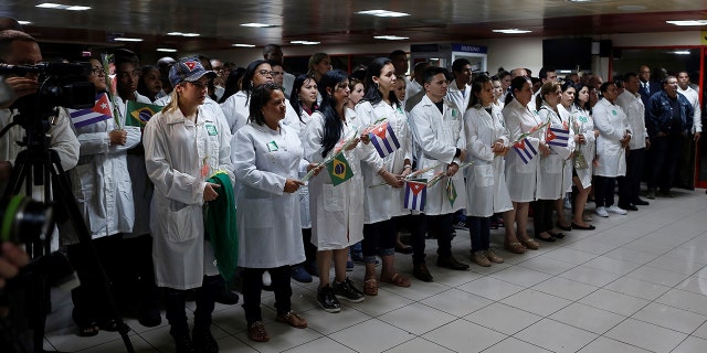 Cuban doctors on mission in Venezuela say they were forced to tie ...