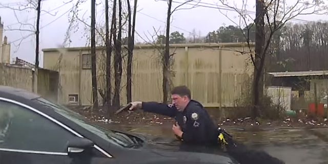 Arkansas Police Officer Fires At Least 15 Times Into Car While On Hood