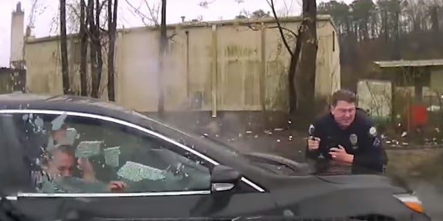 Arkansas Police Officer Fires At Least 15 Times Into Car While On Hood