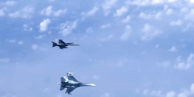 Russian Fighter Jet Chases Off Nato Warplane Approaching Plane Carrying