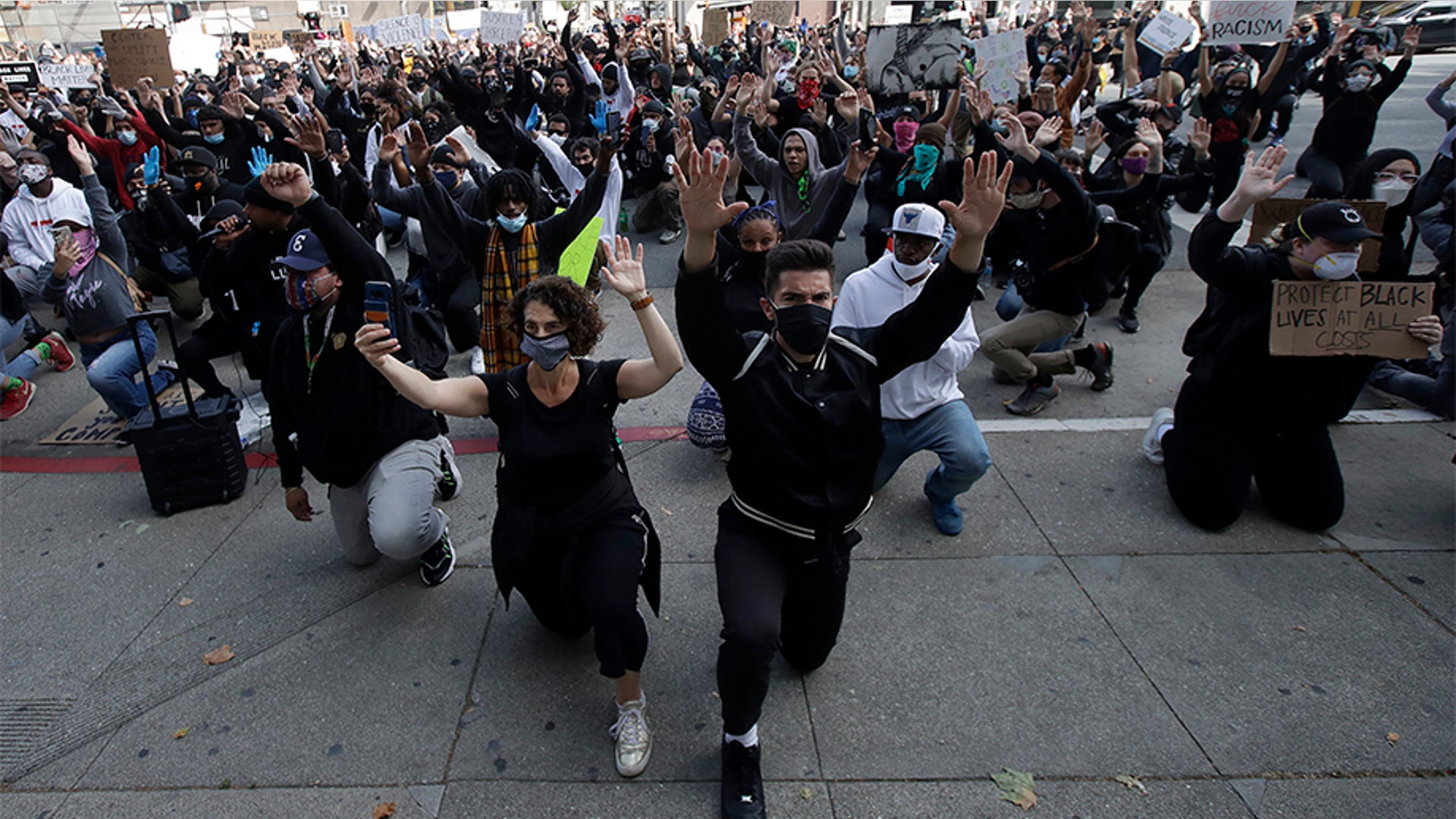 George Floyd protesters embrace 'taking a knee' for race awareness ...