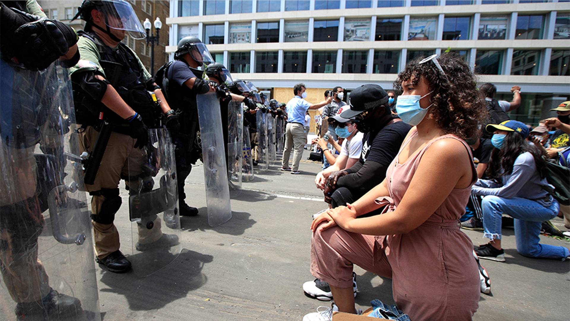 George Floyd Protesters Embrace Taking A Knee For Race Awareness