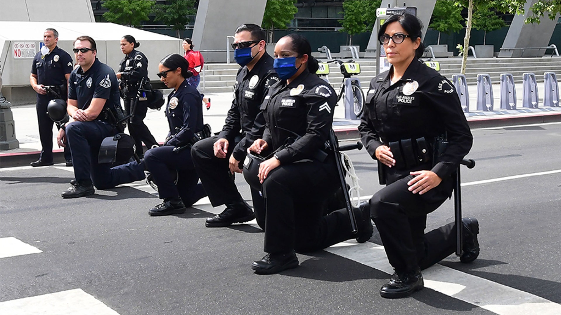 George Floyd protesters embrace 'taking a knee' for race awareness ...