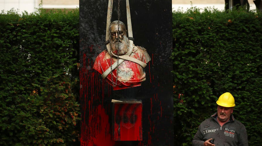 Belgium dismantles statue of former monarch as king expresses 'deepest ... Belgium dismantles statue of former monarch as king expresses 'deepest ...