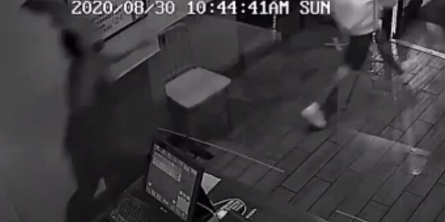 Pizza Hut Employee Filmed Chasing Robbery Suspects Away While