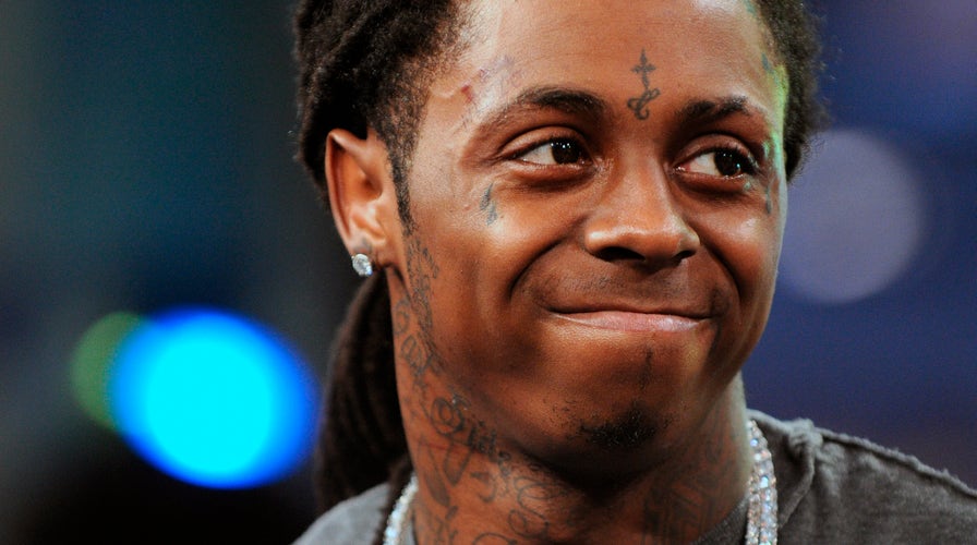 Donald Trump Pardons Commutes Lil Wayne Kodak Black Sentences