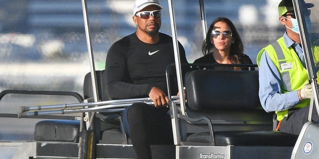 Tiger Woods Seen On Crutches As He Arrives In Los Angeles Presumably