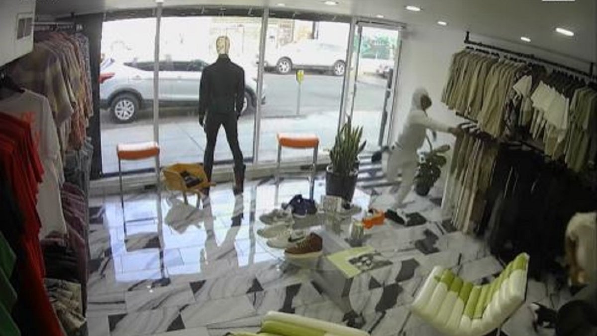La Attempted Robbery Spills Into Clothing Store As Security Footage