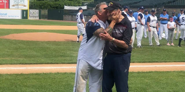 100-year-old WWII veteran throws first pitch at Long Island Ducks ...