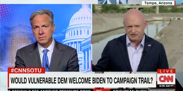 Sen. Mark Kelly appears to dodge question about Biden campaigning with ...