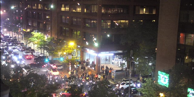 Video shows chaotic scene as cars do donuts, fireworks set off in ...