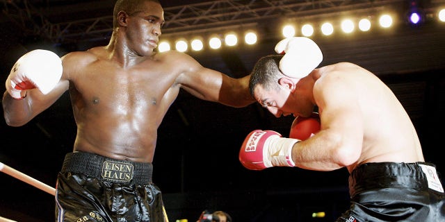 U.S. Justice Department charges ex-boxer with trafficking more than $1 ...