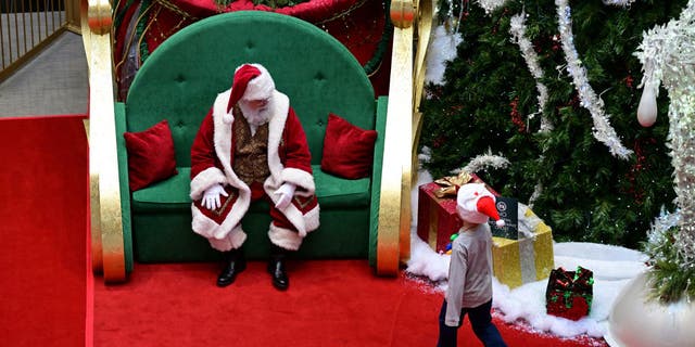 Worried about your kid freaking out during a Santa visit? Check out ...