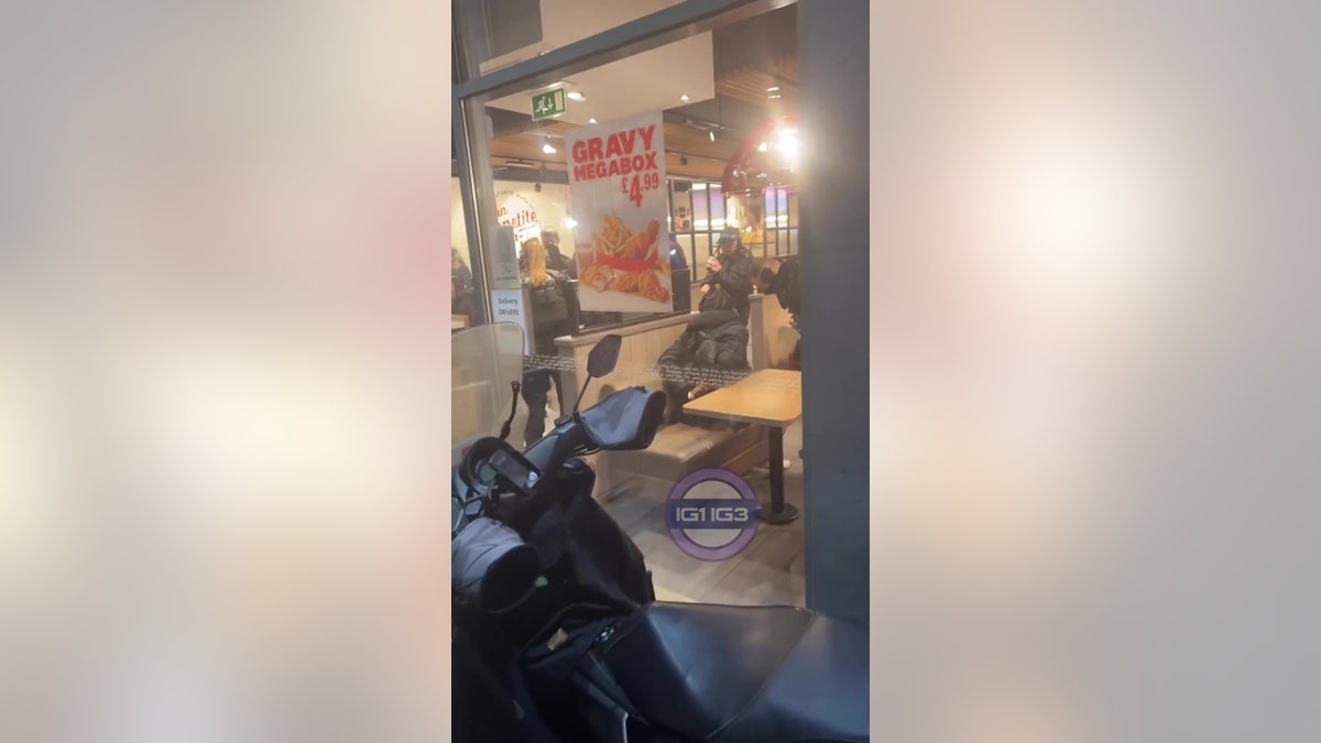 Armed UK police storm KFC restaurant after 'youth' seen with weapon ...