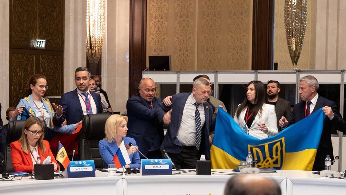 Video Shows Ukrainian Delegate Punching Russian Official Who Grabbed